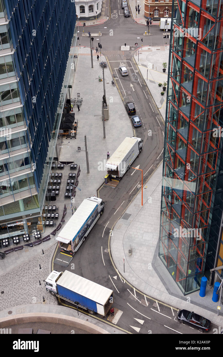 Aerial view of trucks unloading/loading in the streets of London Stock ...