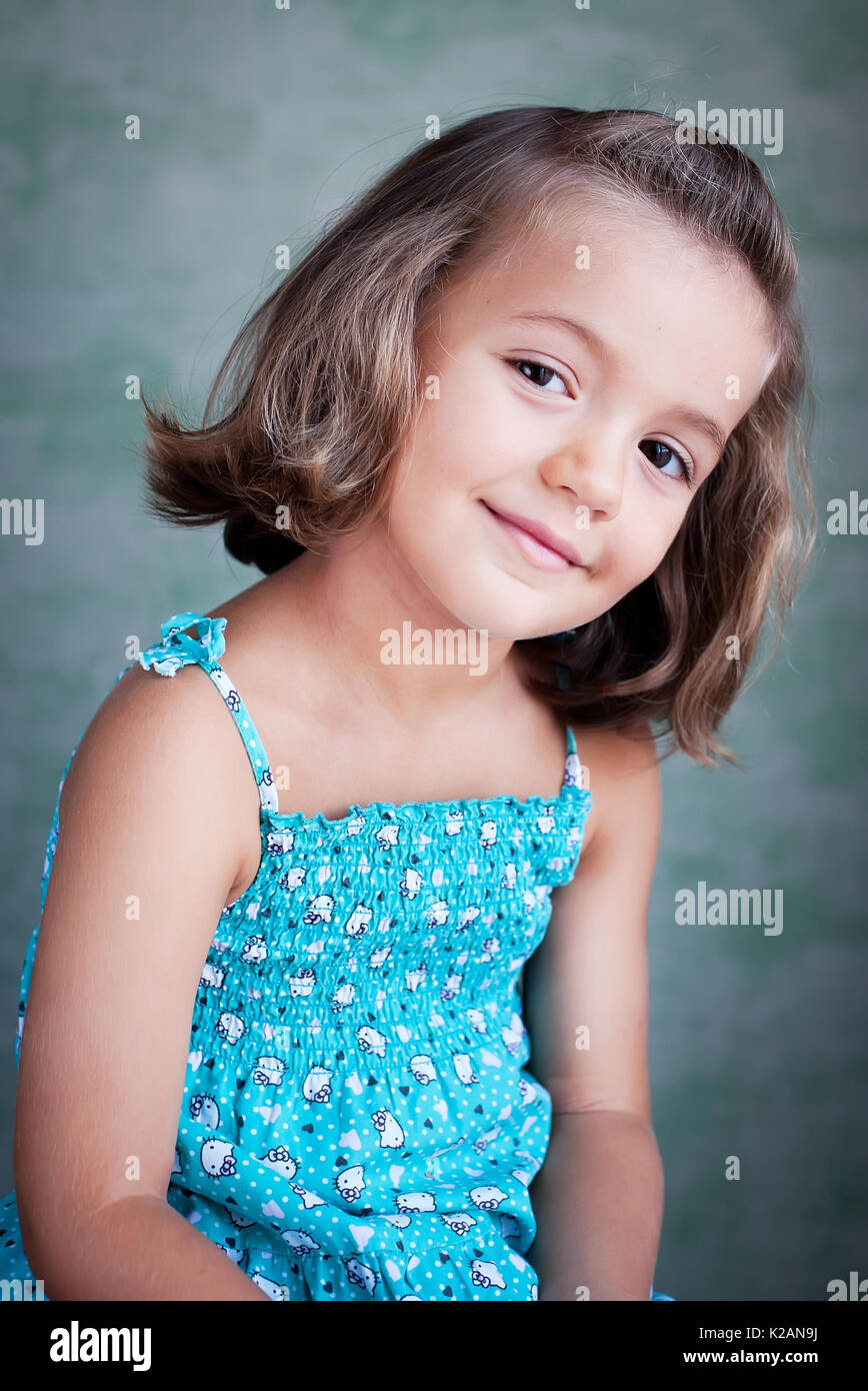 Portrait of a cute girl in the studio Stock Photo - Alamy