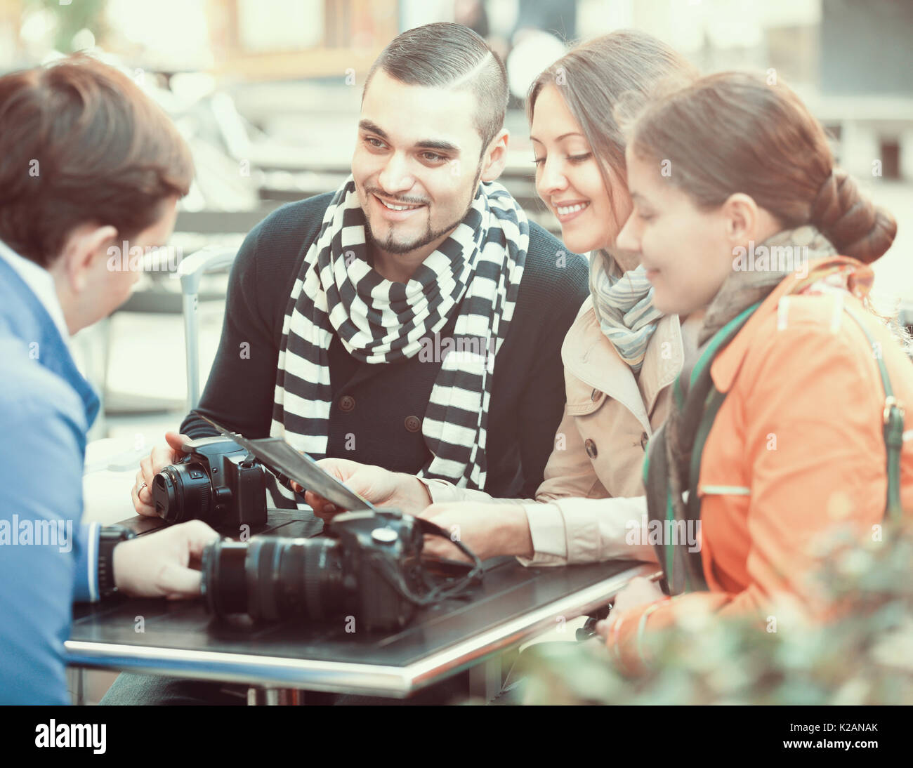 Group positive smiling tourists hi-res stock photography and images - Alamy