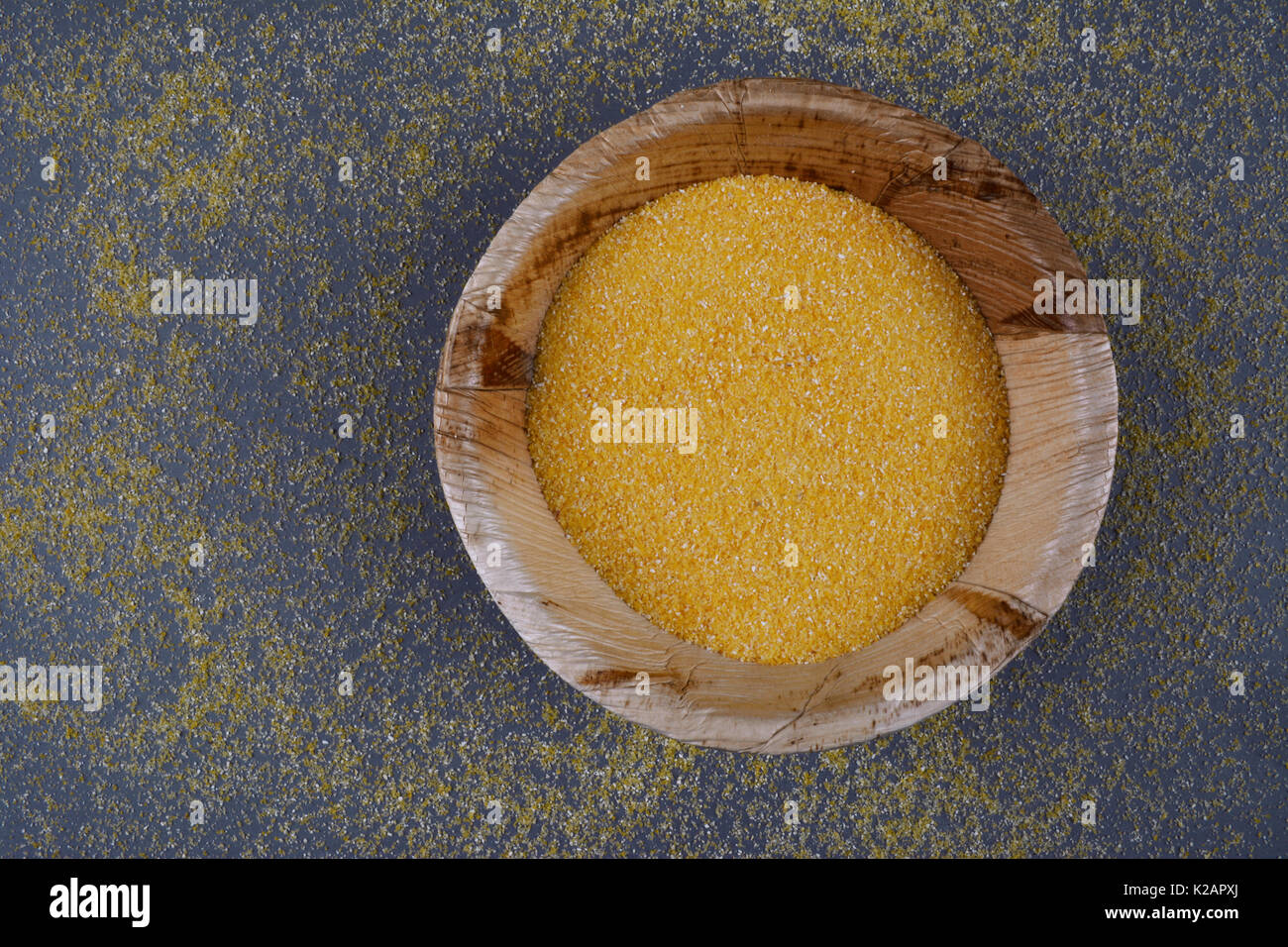 Corn meal of dry polenta on dark background. Flat lay style Stock Photo ...