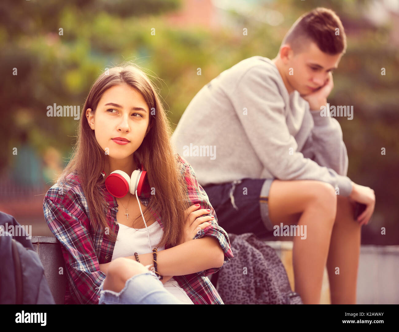 Portrait of frustrated girl and angry boy teenagers after quarrel Stock ...