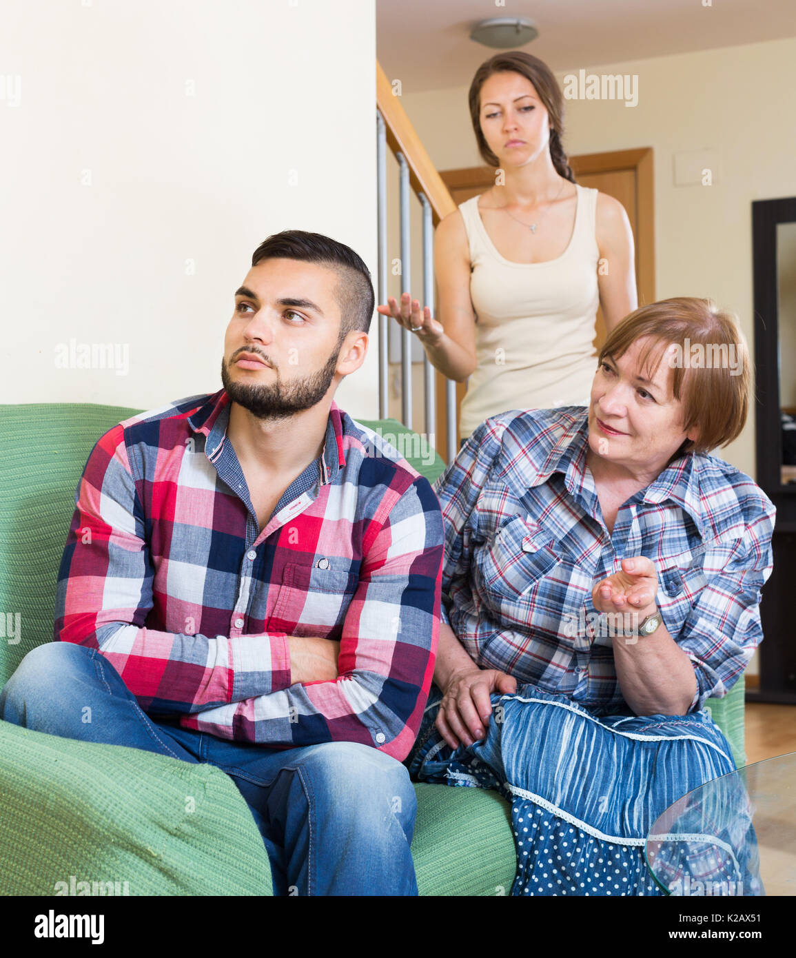 sad family quarrels with the husbands mother Stock Photo - Alamy