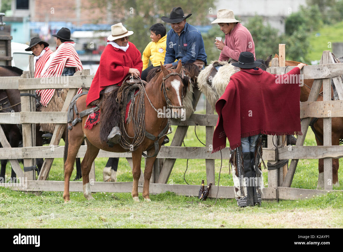 Cowboys sitting on fence hi-res stock photography and images - Alamy