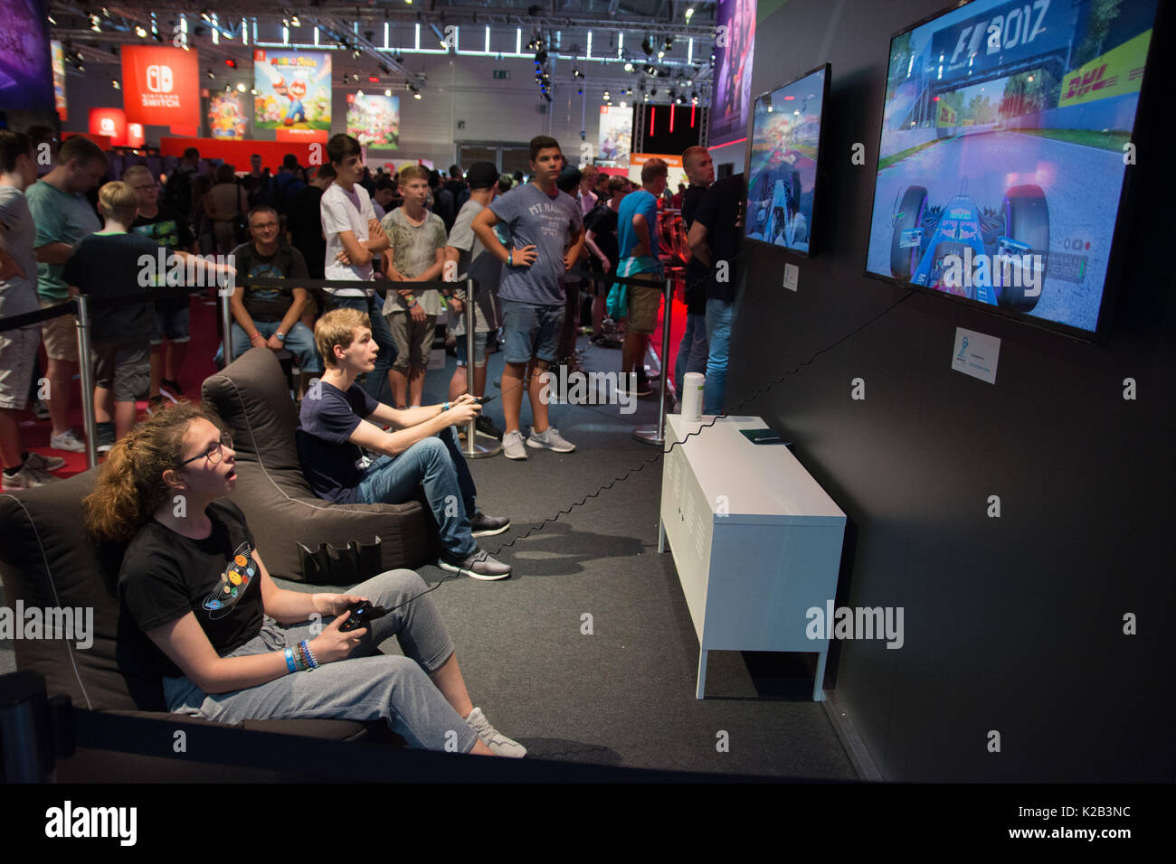 Gamer playing video game convention High Resolution Stock Photography ...