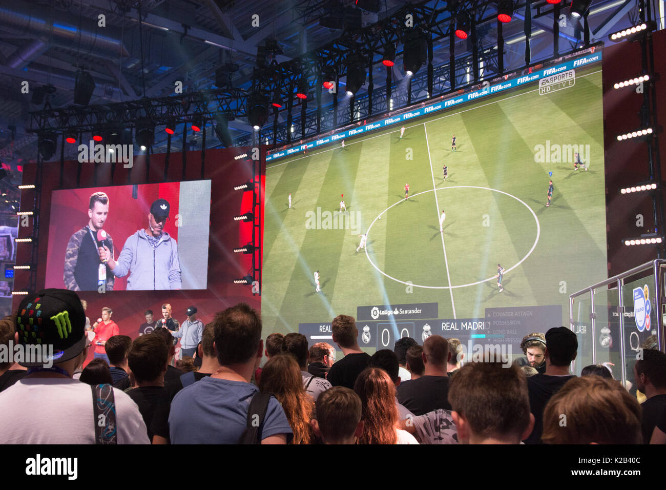 Gamer playing video game convention hi-res stock photography and images ...