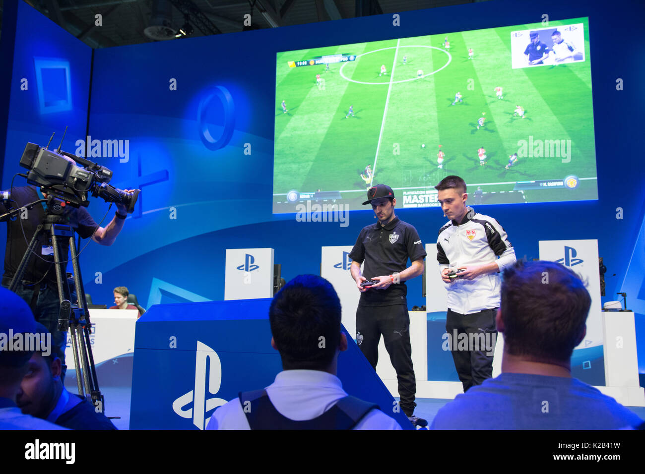 Gamer playing video game convention hi-res stock photography and images ...