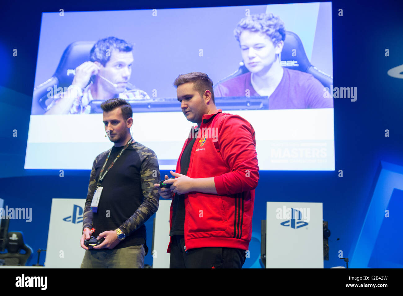 Gamer playing video game convention hi-res stock photography and images ...