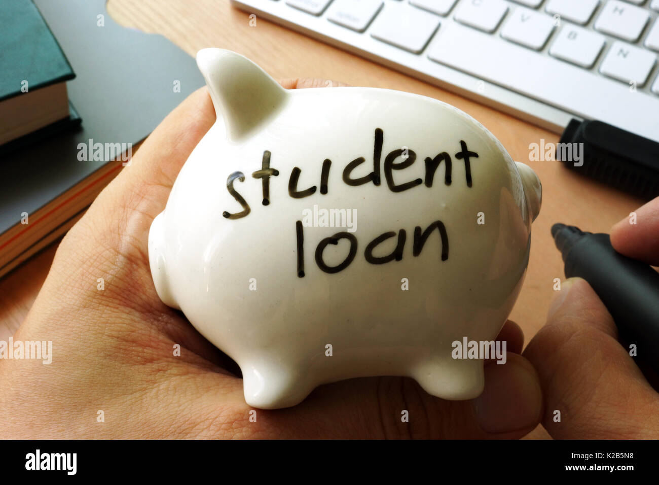 University student piggy bank hi-res stock photography and images - Alamy