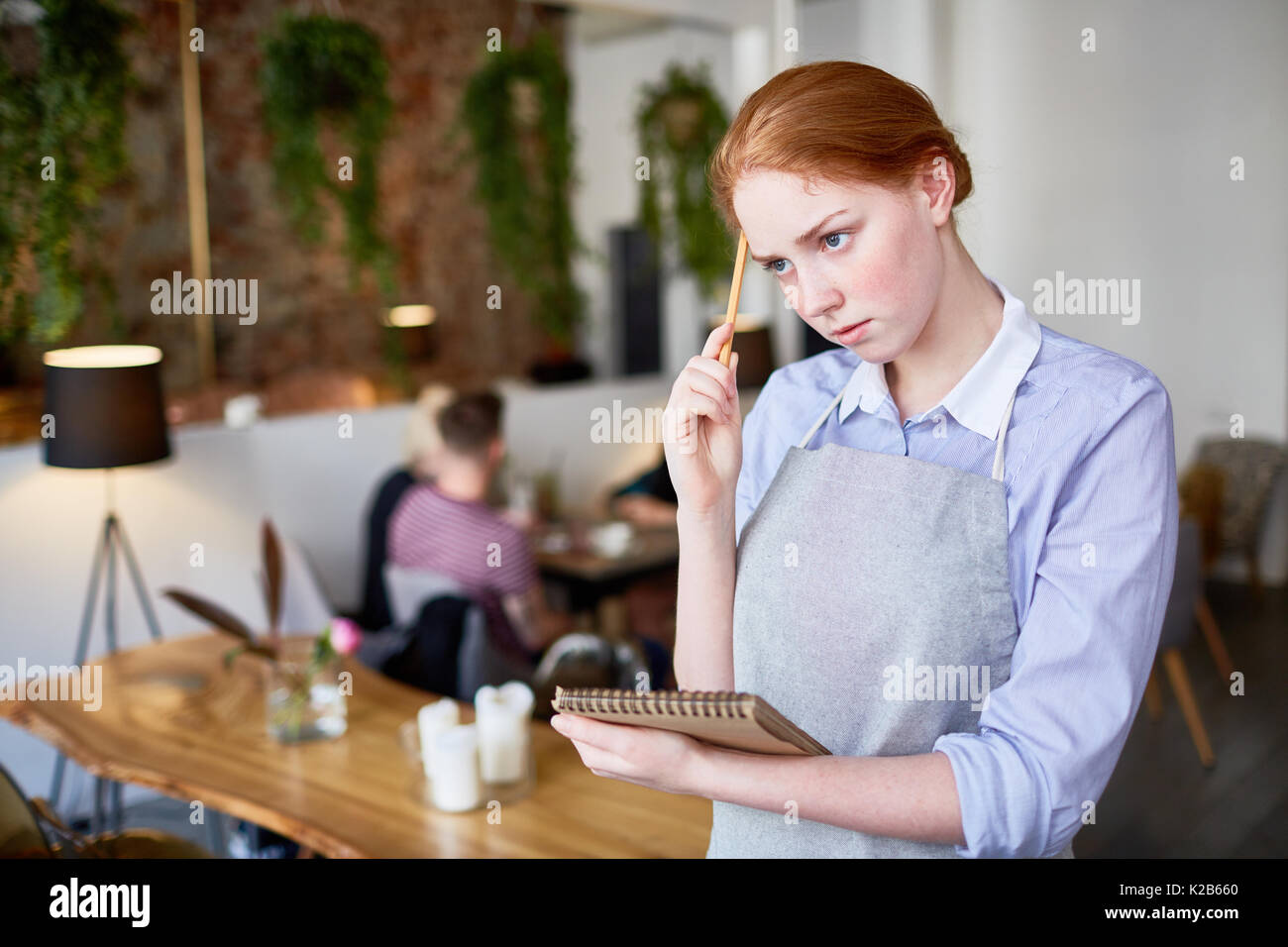 Waitress at work Stock Photo - Alamy