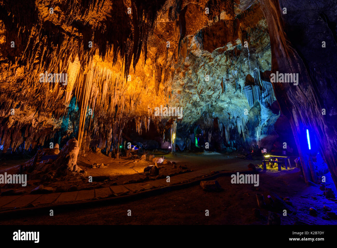Stalactite stalactites with color lighting in cave Stock Photo - Alamy
