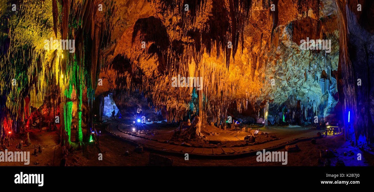 Stalactite stalactites with color lighting in cave Stock Photo - Alamy