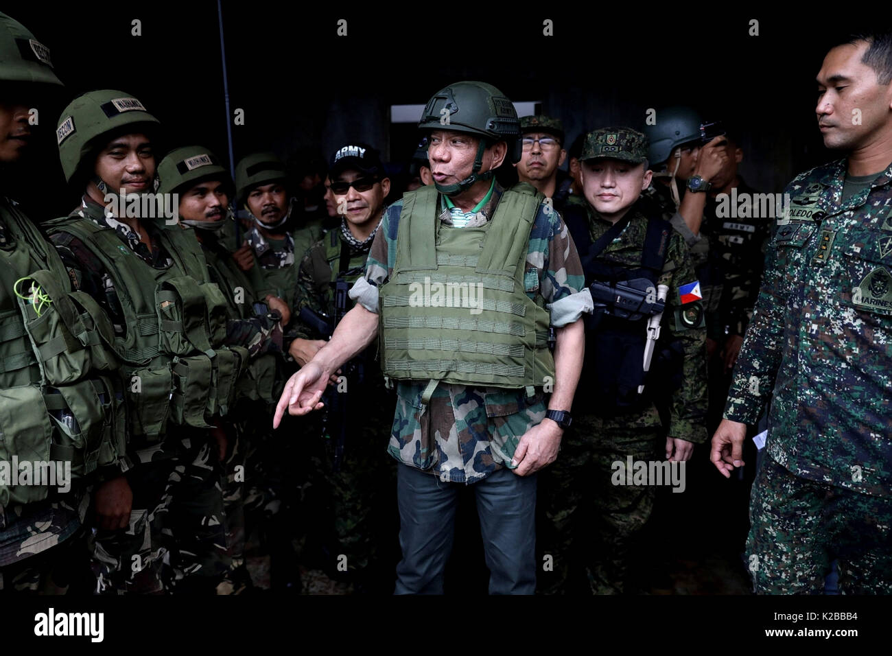 Philippine President Rodrigo Duterte wearing full battle gear visits ...