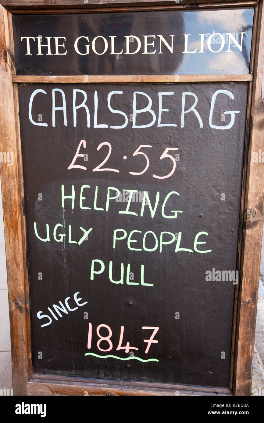 A funny sign outside a pub in Barnard Castle, UK Stock Photo - Alamy