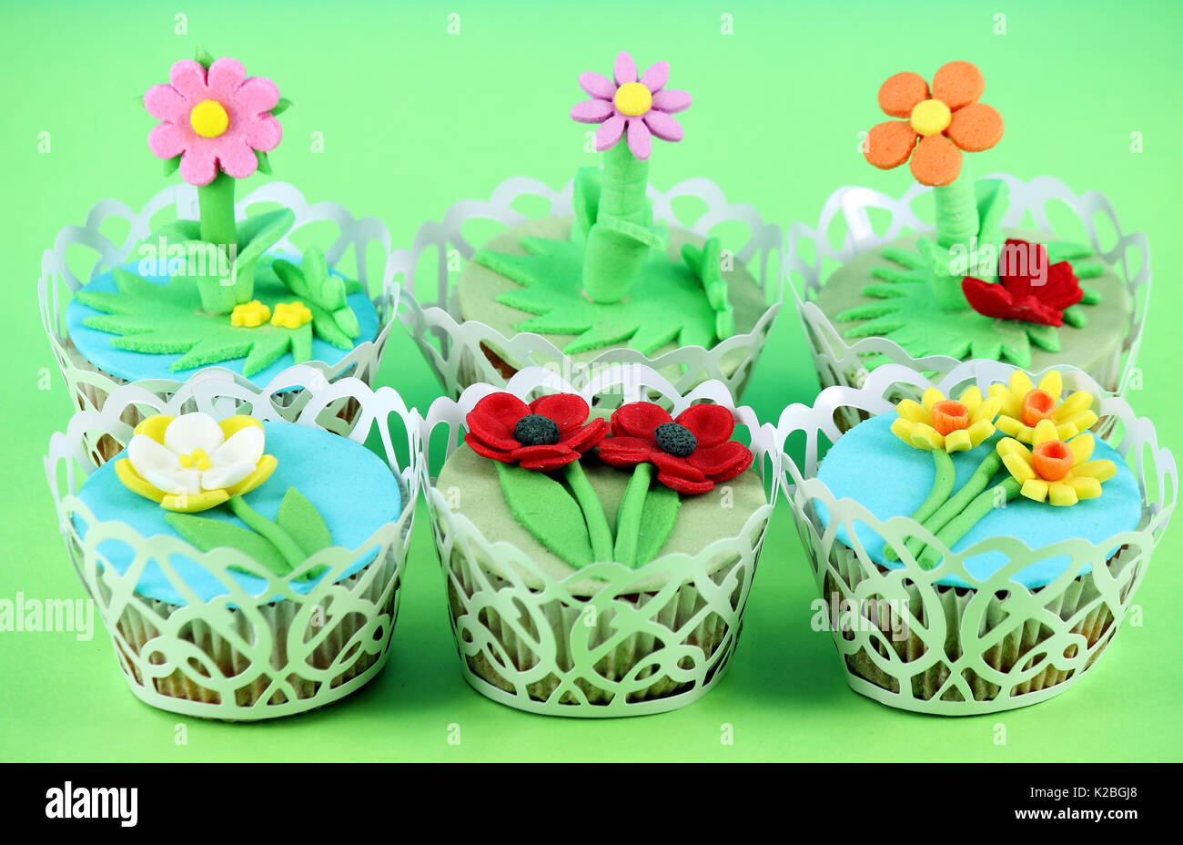 sweet spring flowers muffin cakes Stock Photo - Alamy