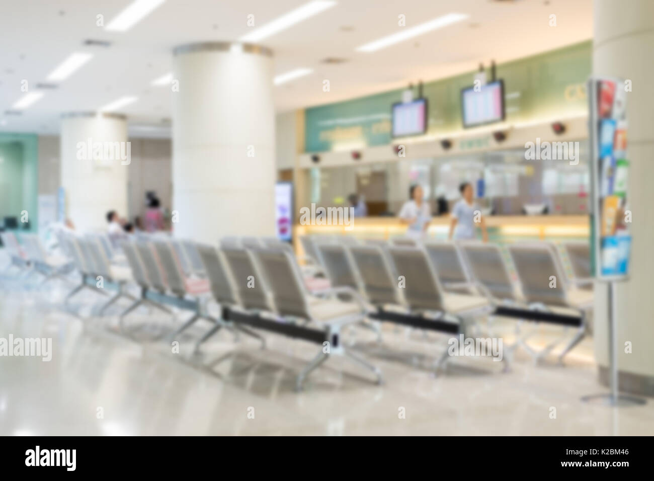 Blurry dispensing area in private hospital with row of chair Stock ...