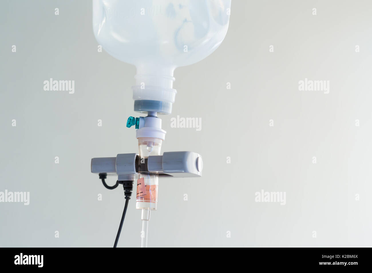 Close up valve of saline solution tube with clear background Stock ...