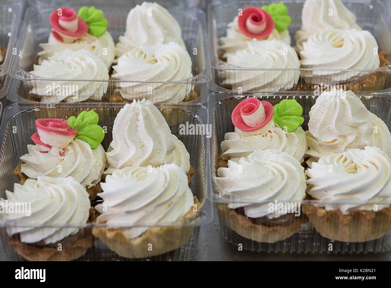 Ready mini cakes on factory Stock Photo - Alamy