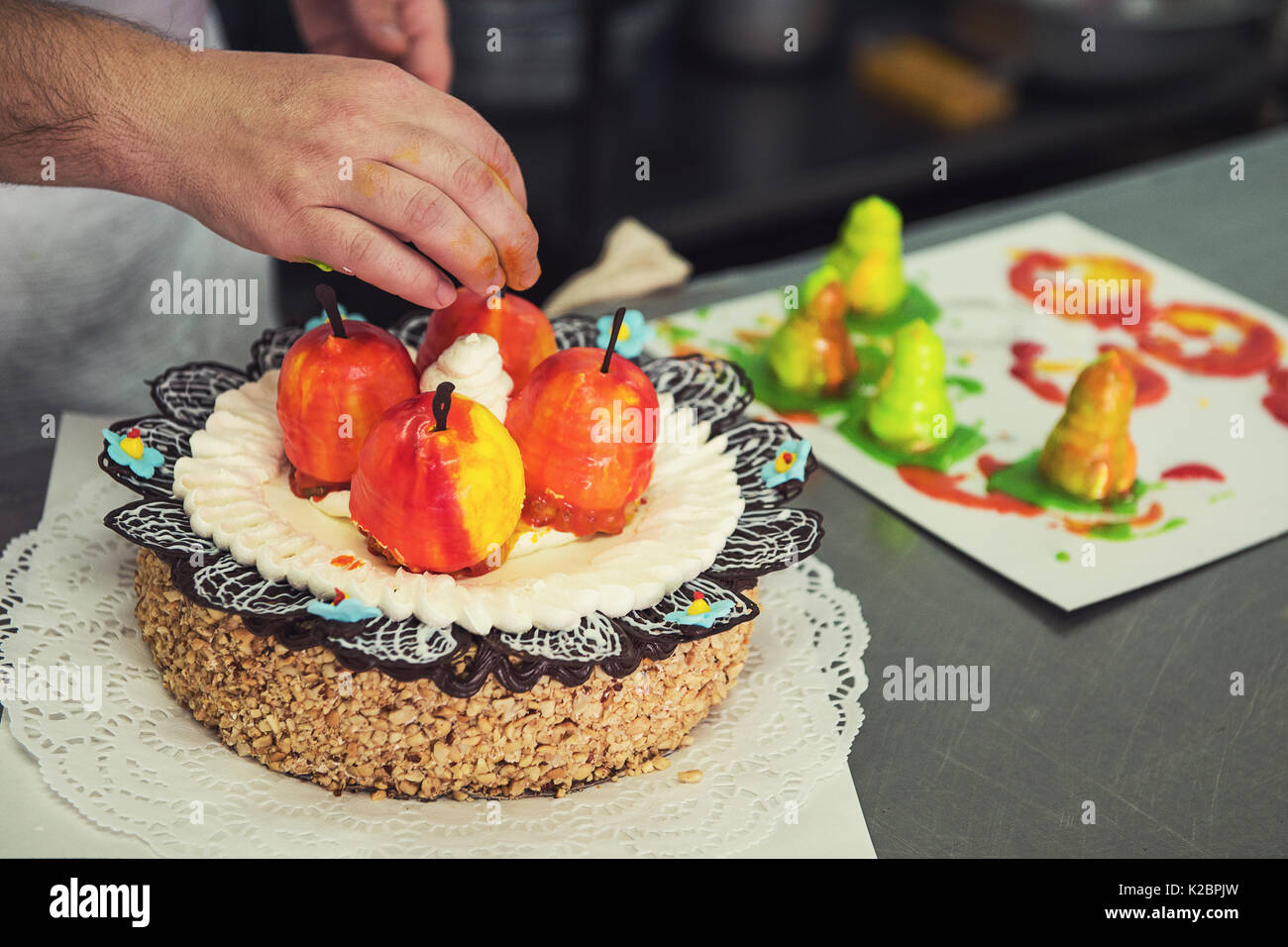 Manual cakes production on factory Stock Photo - Alamy