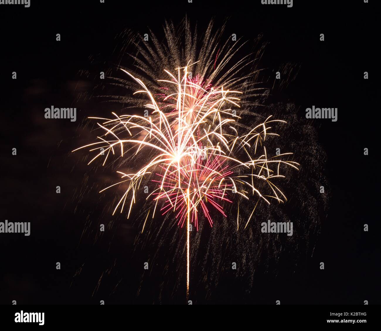 Fireworks burst in the air on 4th of July Stock Photo - Alamy