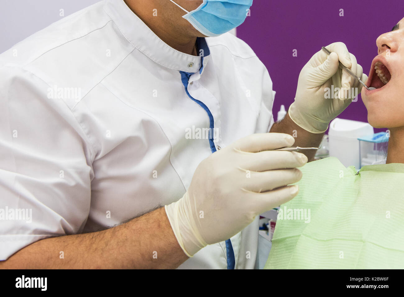 Dentist working in dentist office Stock Photo - Alamy