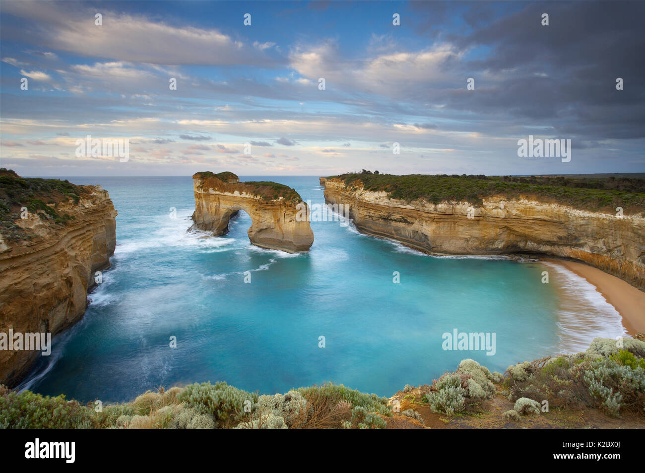 Window arch at Loch Ard Gorge at dawn, Port Campbell National Park ...