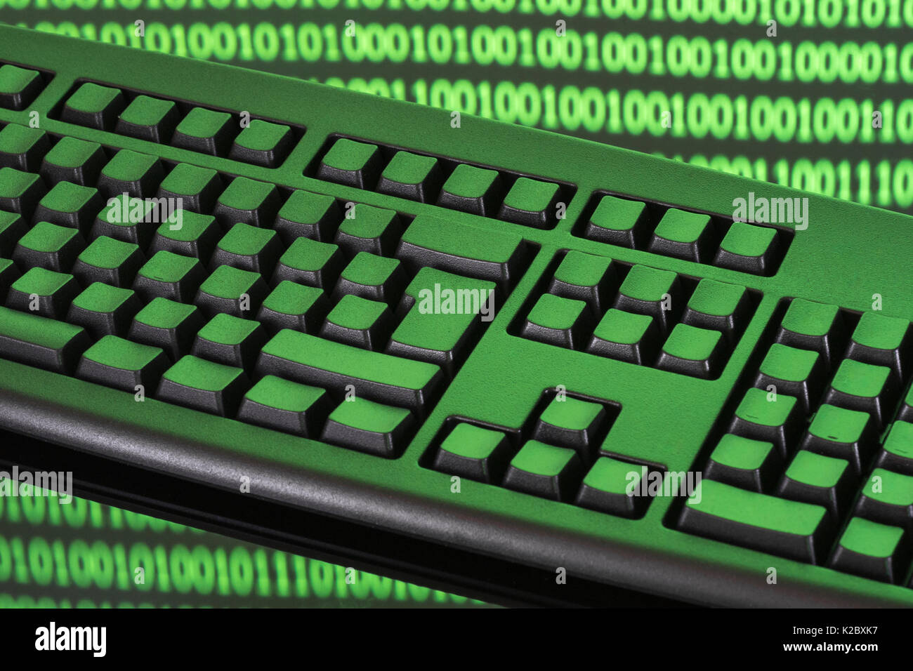 Black keyboard + binary code - for online transactions, cybercrime ...