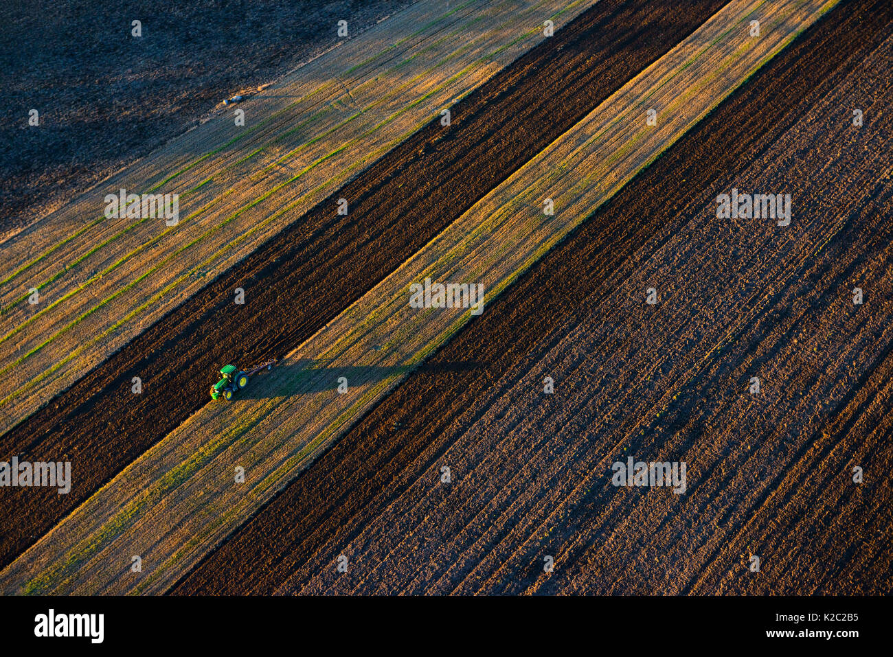 Aerial view of a tractor ploughing, Vooremaa Landscape Reserve ...
