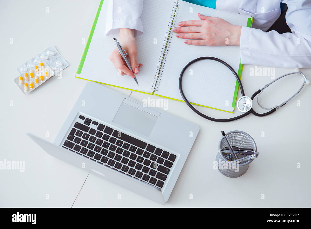 Hand writing medical prescription in computer Stock Photo - Alamy