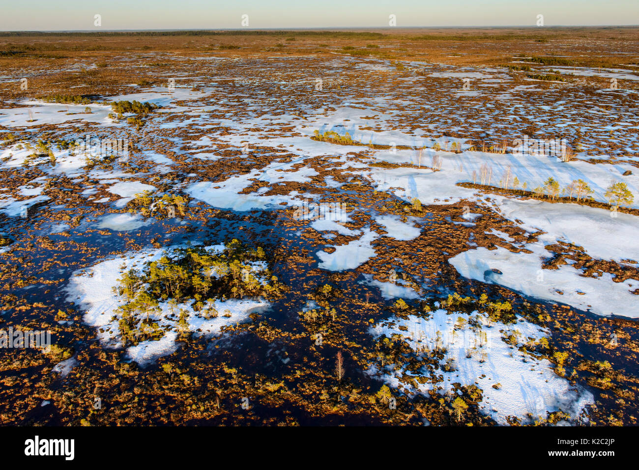 Aerial view of ice melting in Kuresoo bog, Soomaa National Park in ...