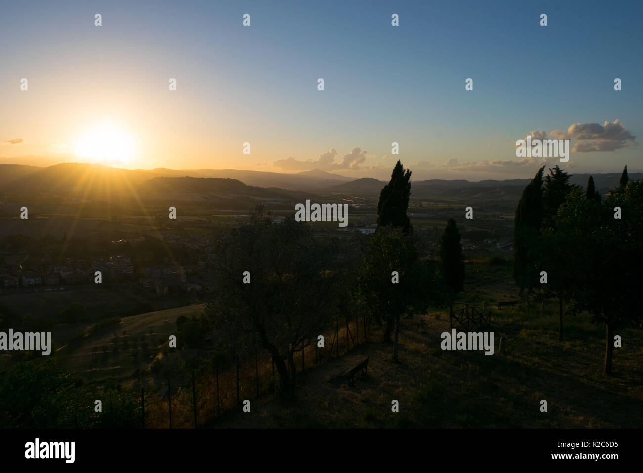 Sunset over the panoramic countryside and farmland, viewed from an ...