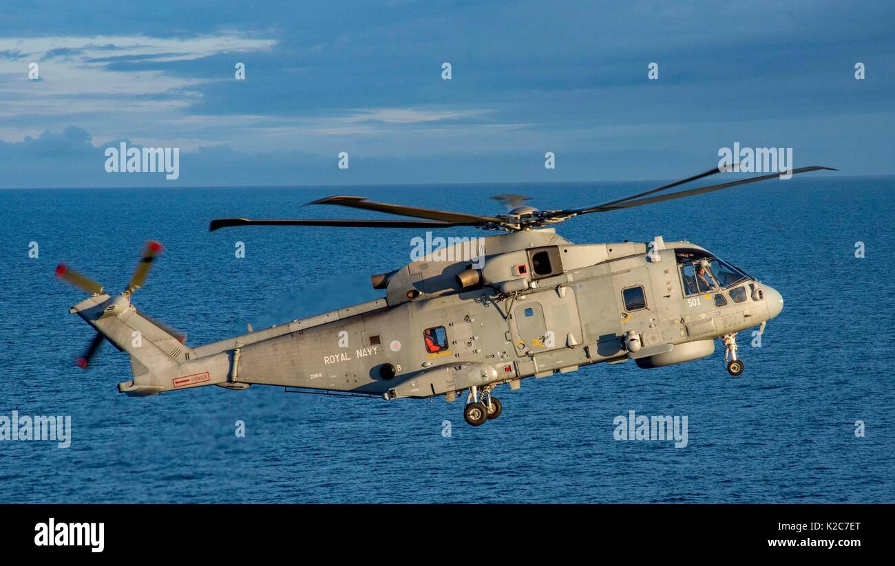 A Royal British Navy Merlin Mk2 helicopter prepares to land on the ...