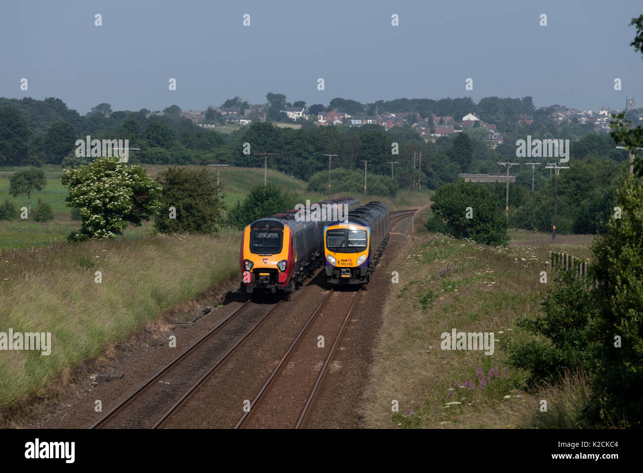 Virgin voyager train passes a First Transpennine express class 185 at ...