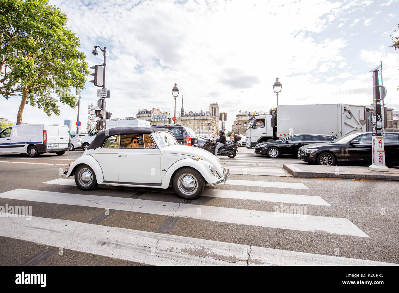 Driving retro car in Paris Stock Photo - Alamy