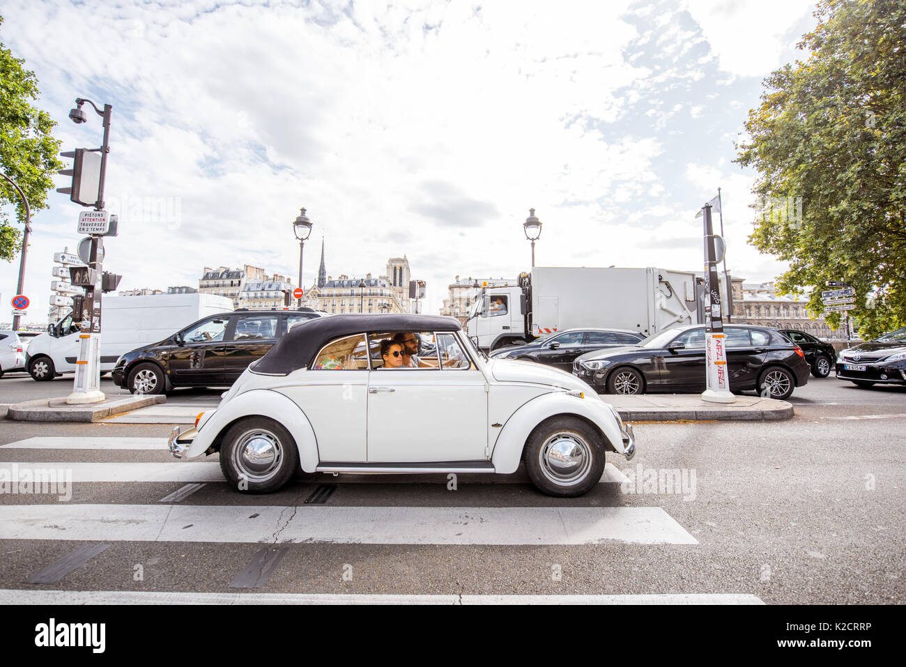 Driving retro car in Paris Stock Photo - Alamy