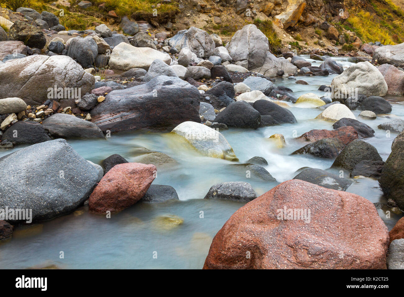 Nature detail: water stream which goes among big stones Stock Photo - Alamy