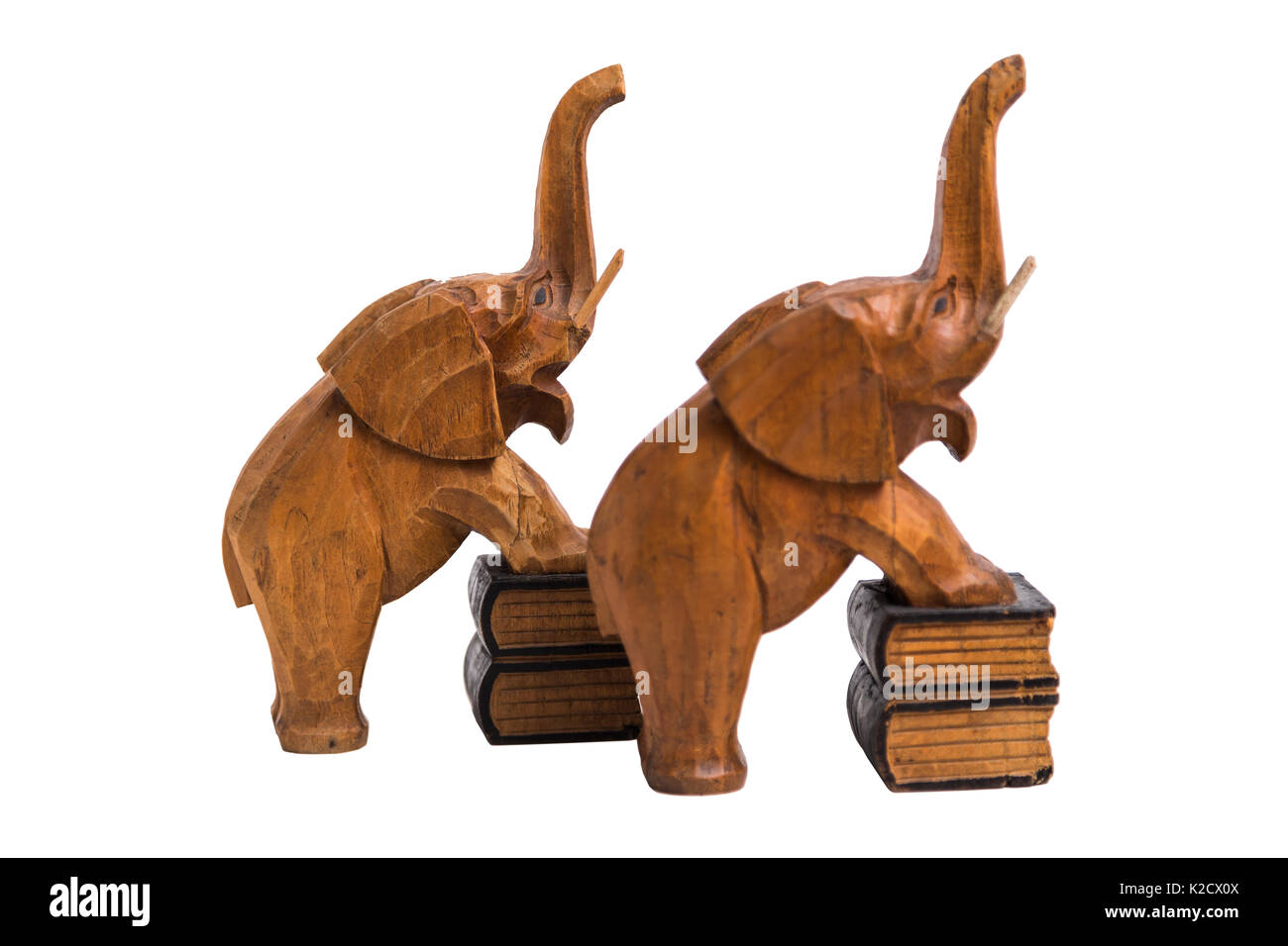 Two vintage old wooden carved brown elephants holders with raised ...
