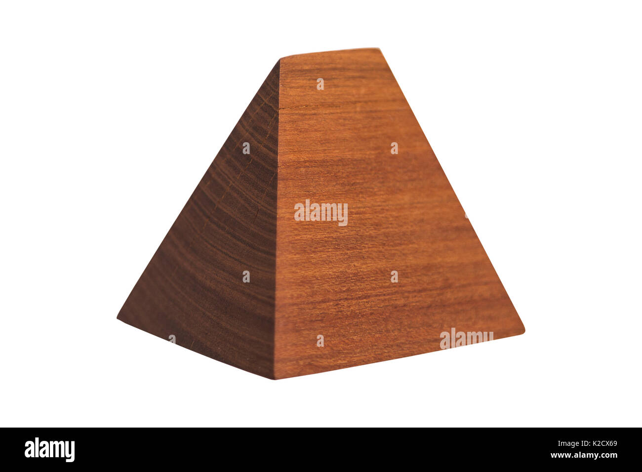 Small clean handmade decorative wooden brown geometric pyramid on ...