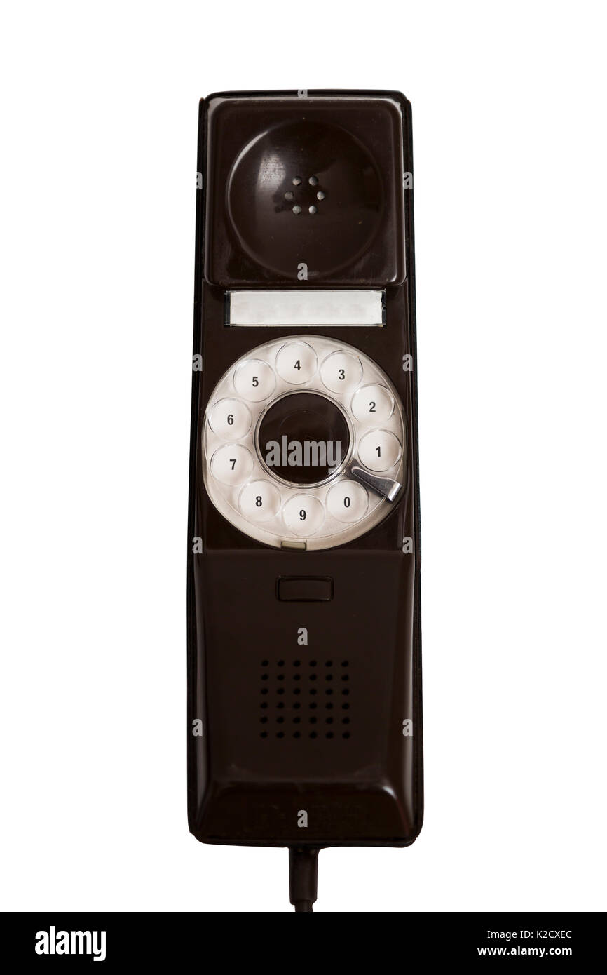Old vintage stationary shiny leather brown plastic telephone with a ...