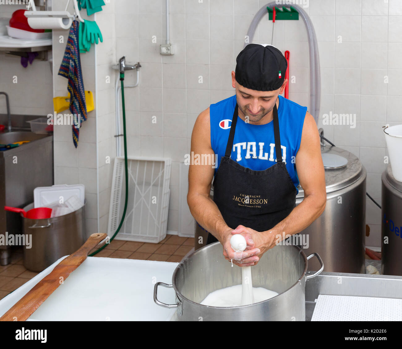 Burrata making hi-res stock photography and images - Alamy