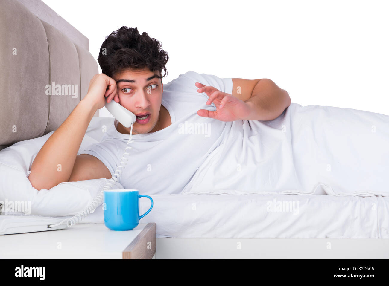 Man in bed suffering from insomnia Stock Photo - Alamy