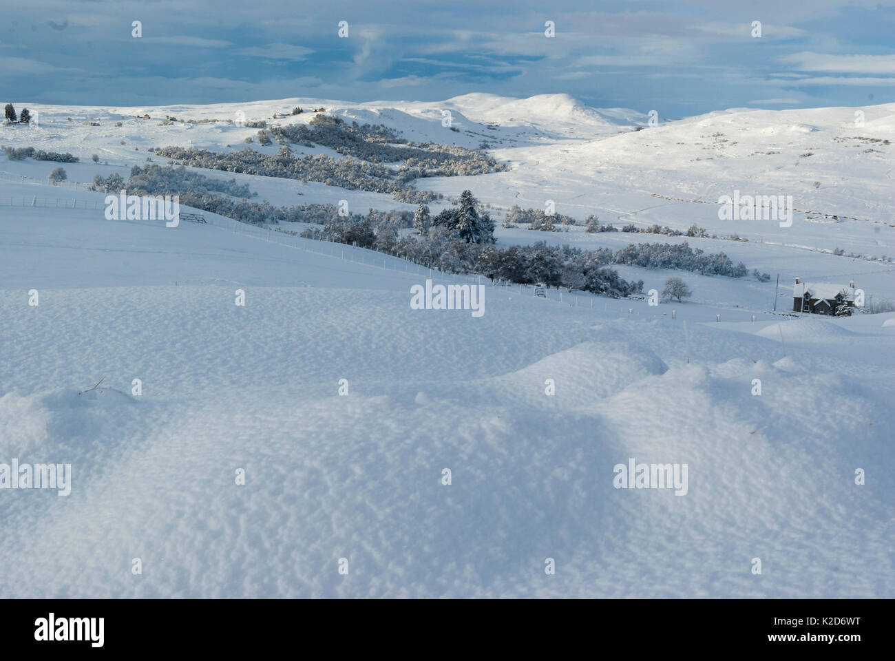 Snow covered rural countryside landscape of Grumby Rock and Strath ...