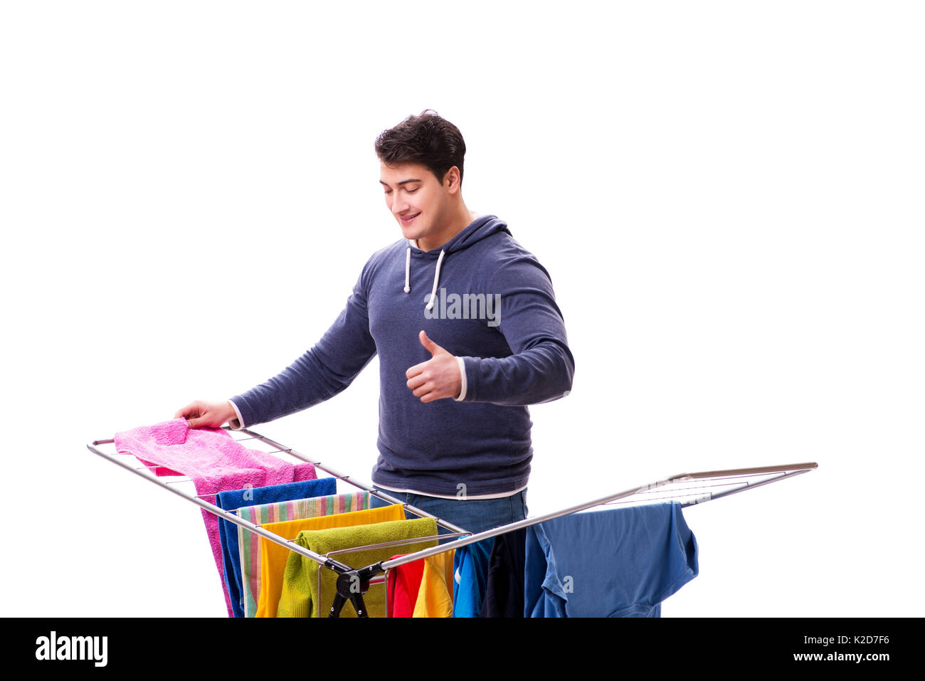 Husband man doing laundry isolated on white Stock Photo - Alamy
