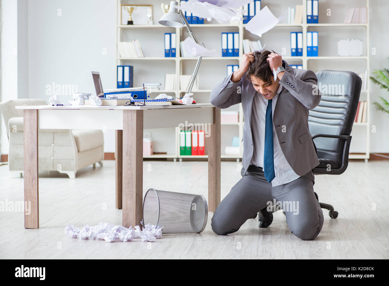 Angry businessman shocked working in the office fired sacked Stock ...