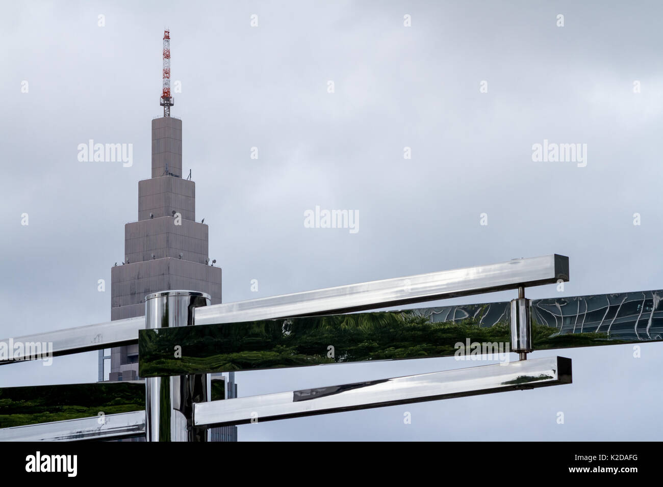 Docomo Tower seen behind a modern sculpture,.Tokyo, Japan Stock Photo ...