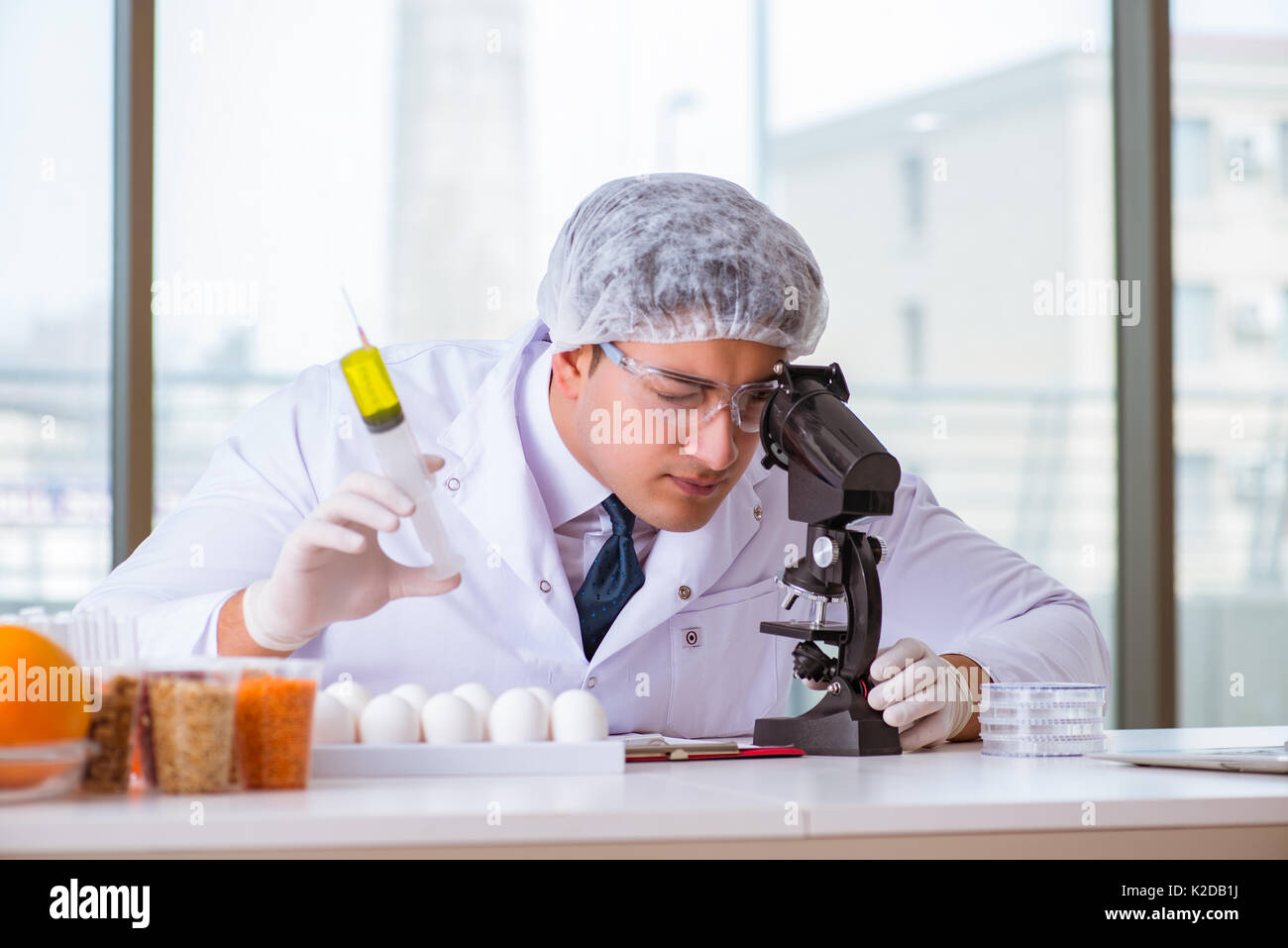 Nutrition expert testing food products in lab Stock Photo - Alamy