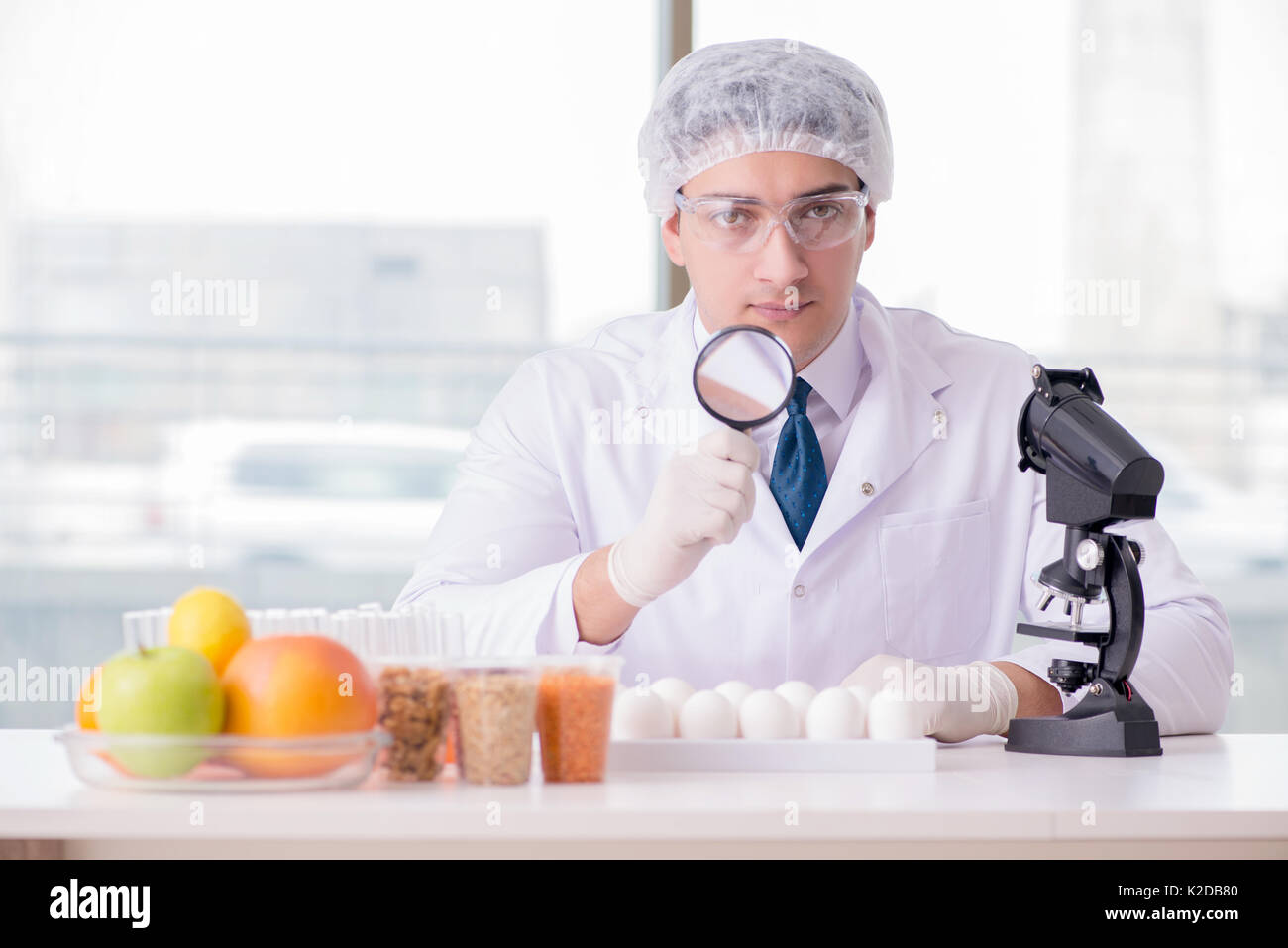 Nutrition expert testing food products in lab Stock Photo - Alamy