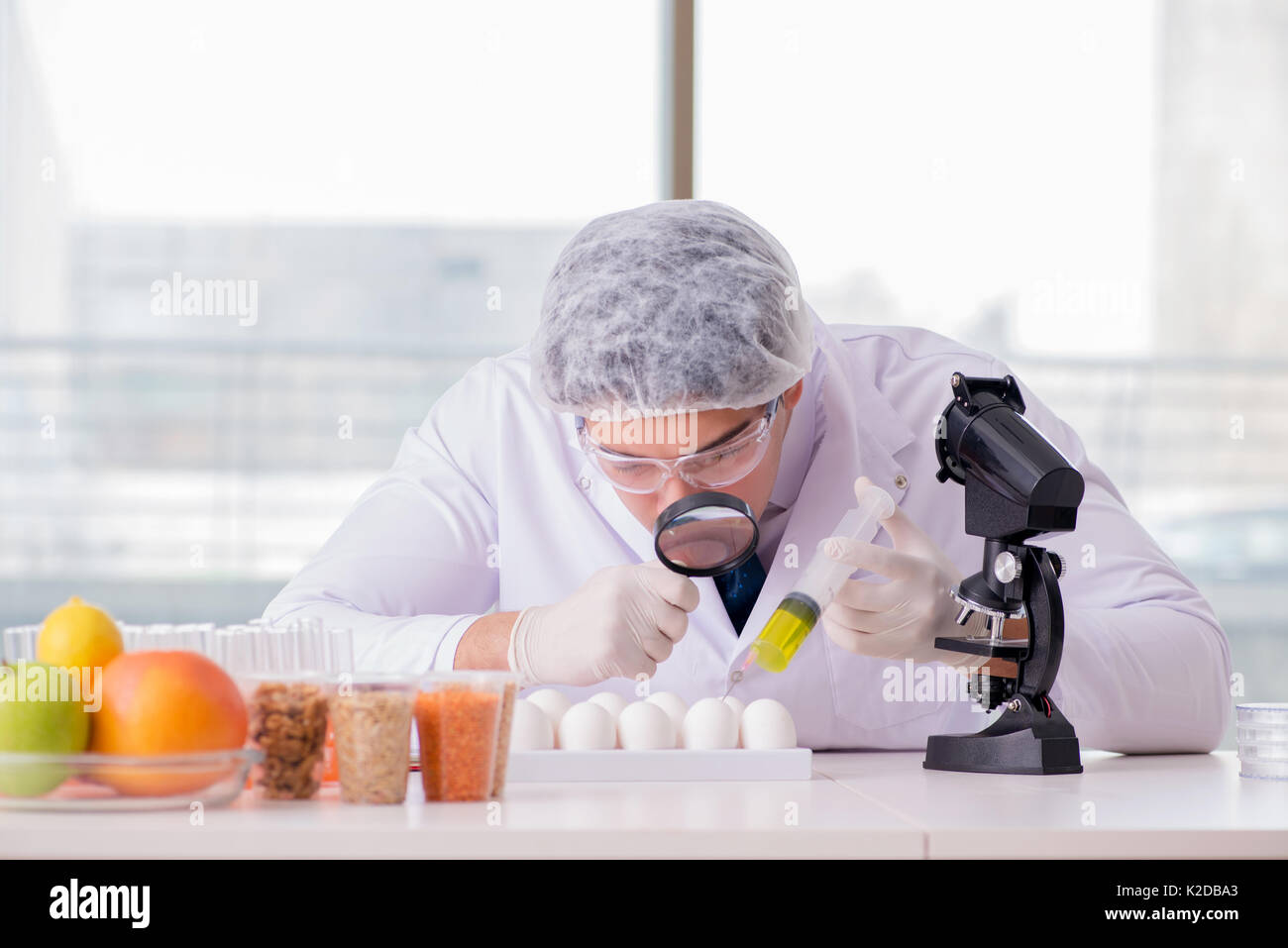 Nutrition expert testing food products in lab Stock Photo - Alamy