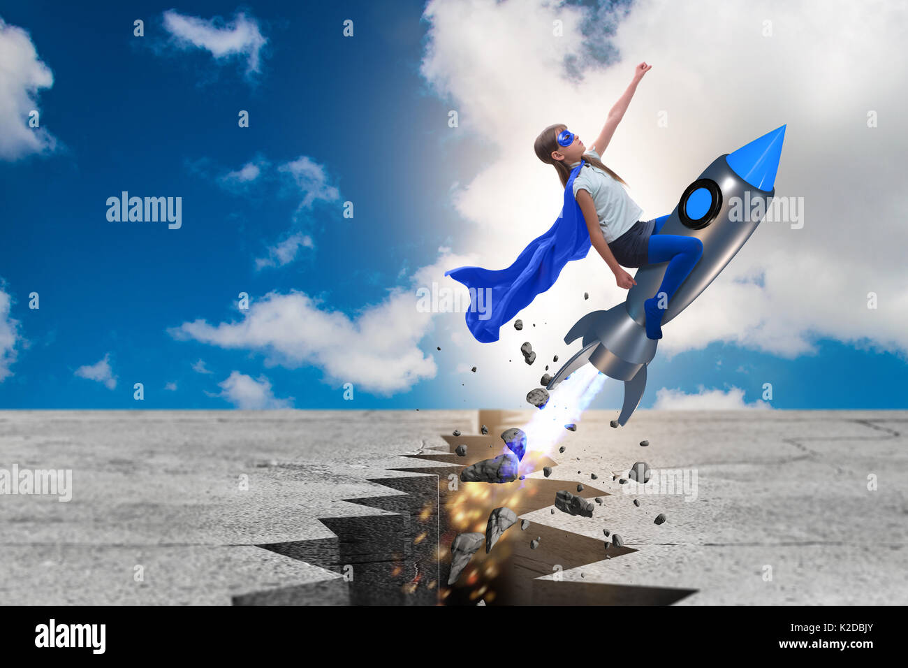 Superhero kid flying on rocket Stock Photo - Alamy