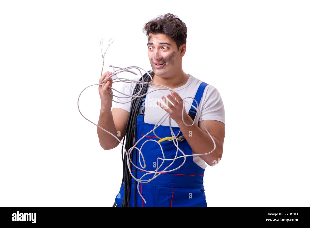 Funny man doing electrical repair Stock Photo - Alamy
