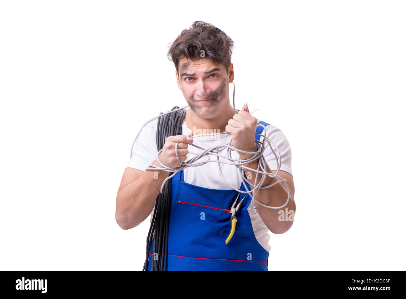 Funny man doing electrical repair Stock Photo - Alamy